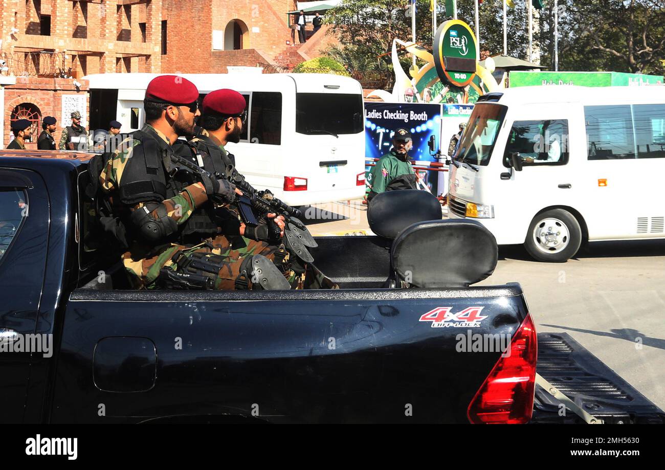 Armed security personnel guard the Gaddafi Stadium in Lahore, Thursday ...