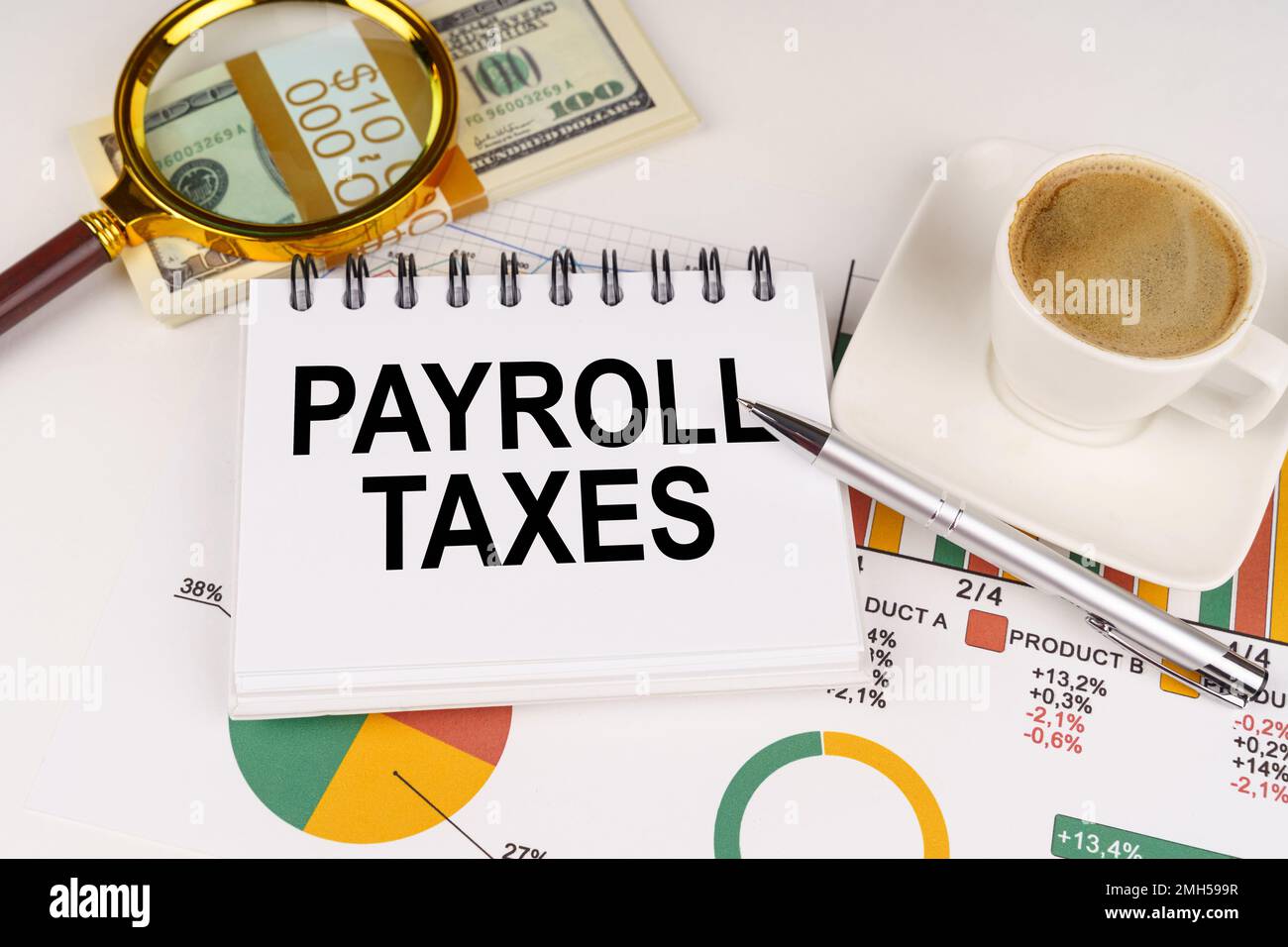 Business concept. On the table is a cup of coffee, money, business ...