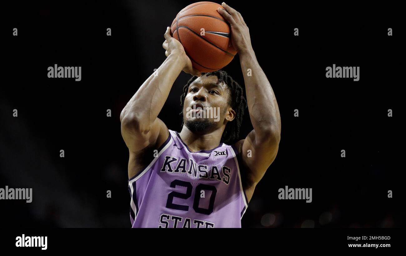 Kansas State's Xavier Sneed shoots during the second half of an NCAA ...