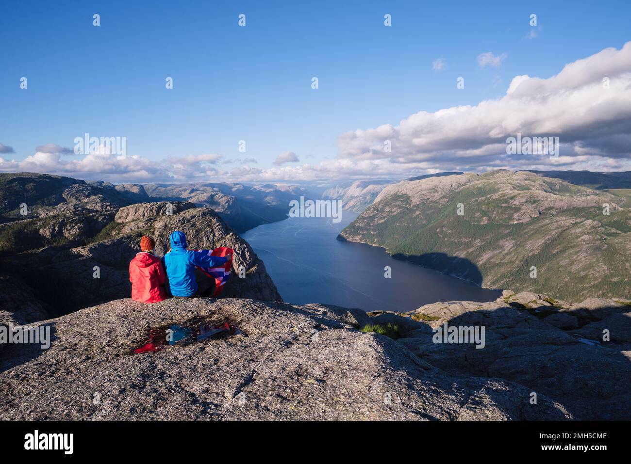 Pathway Pulpit Rock, Norway. Couple looks at the panorama of the ...