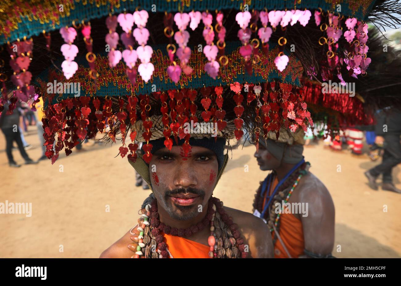 Tribals from the Indian state of Telangana pose for photographs during ...