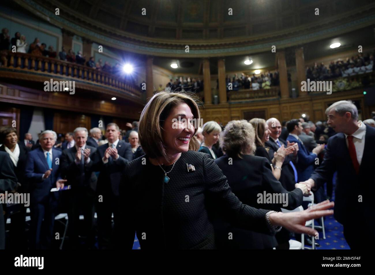 Massachusetts Lt. Gov. Karyn Polito, center, enters the House Chamber ...