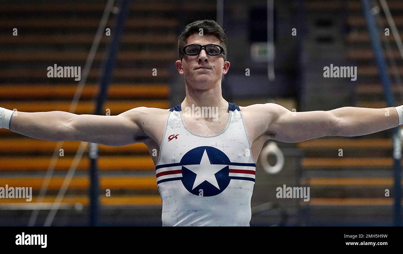 Air Force's Sam Metzler performs on the high bar against California ...