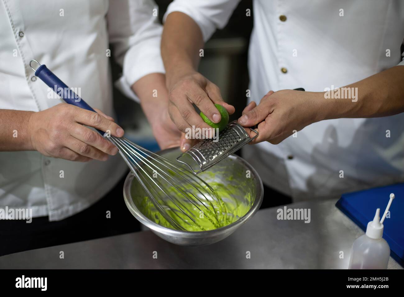 Cook mixing eggs and agar agar. whisk eggs Stock Photo - Alamy