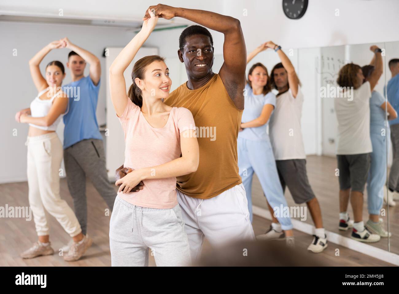 Adult male and young girl dancing pair dance Stock Photo - Alamy