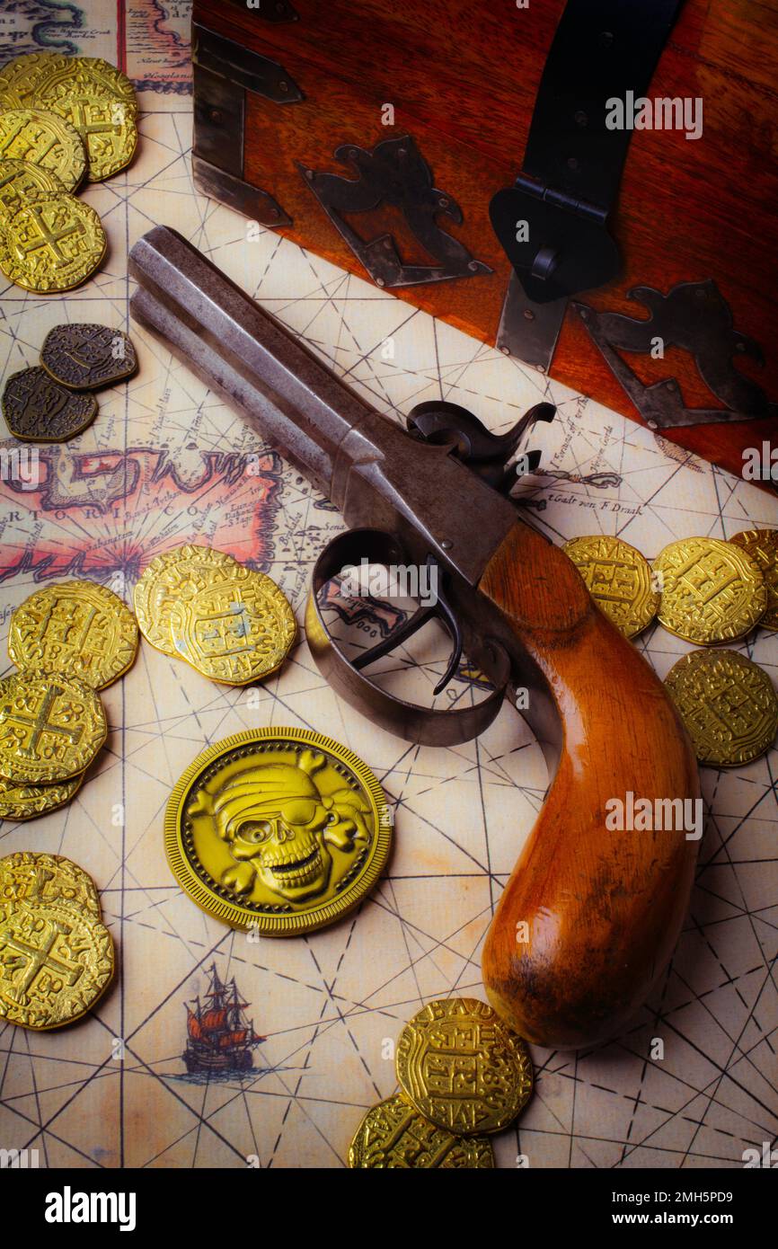Pirates Chest And Pistole Stock Photo - Alamy