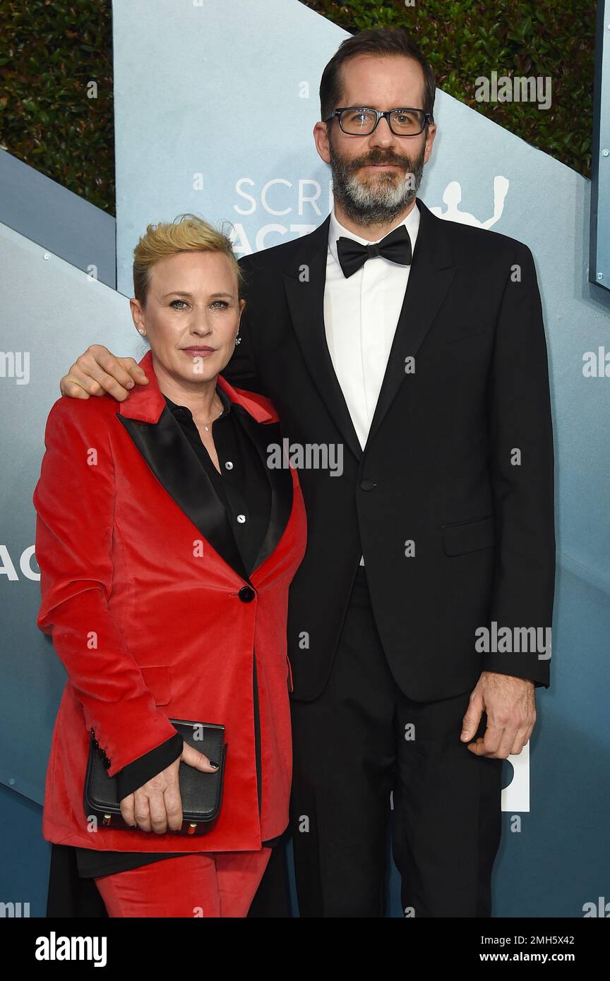 Patricia Arquette, left, and Eric White arrive at the 26th annual ...