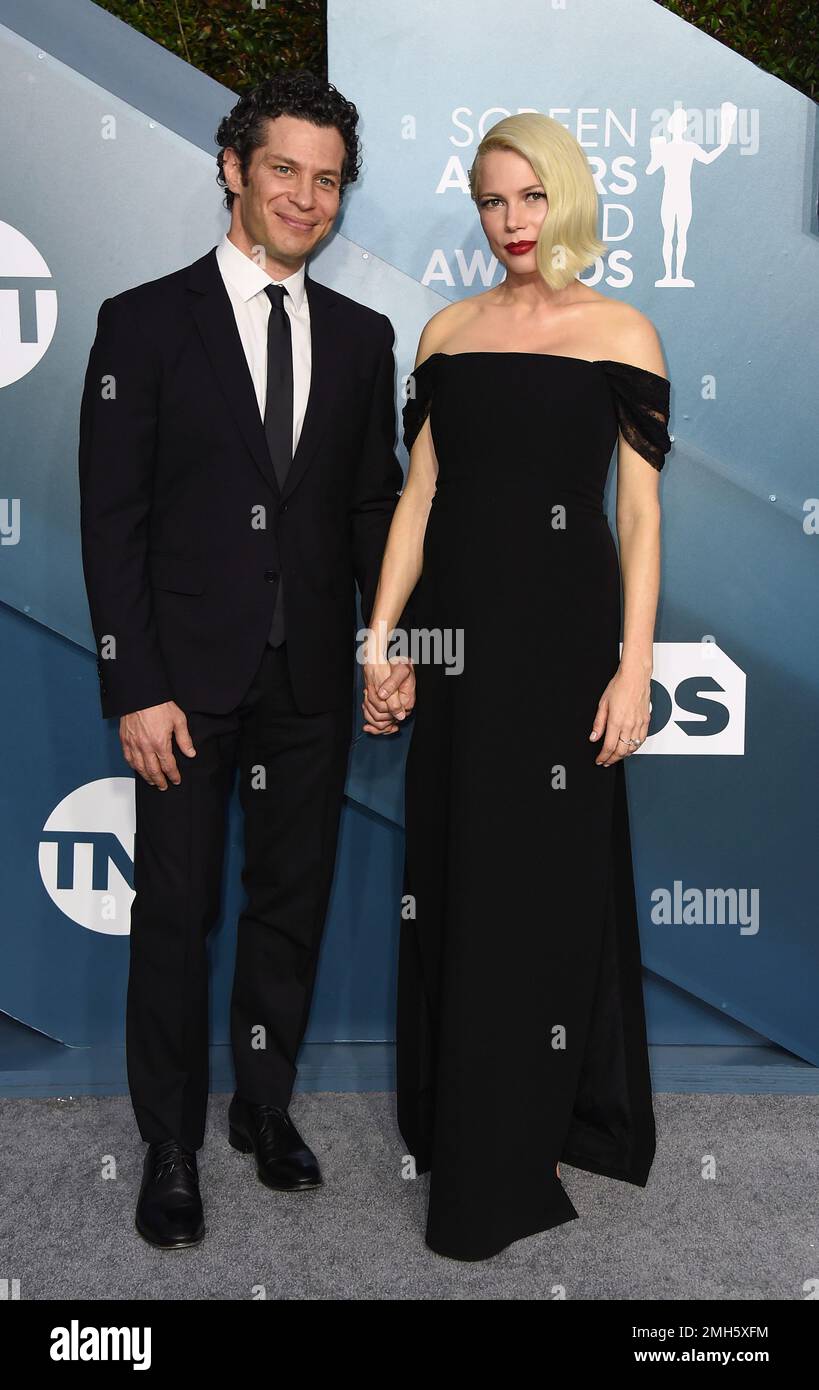 Thomas Kail, left, and Michelle Williams arrive at the 26th annual ...