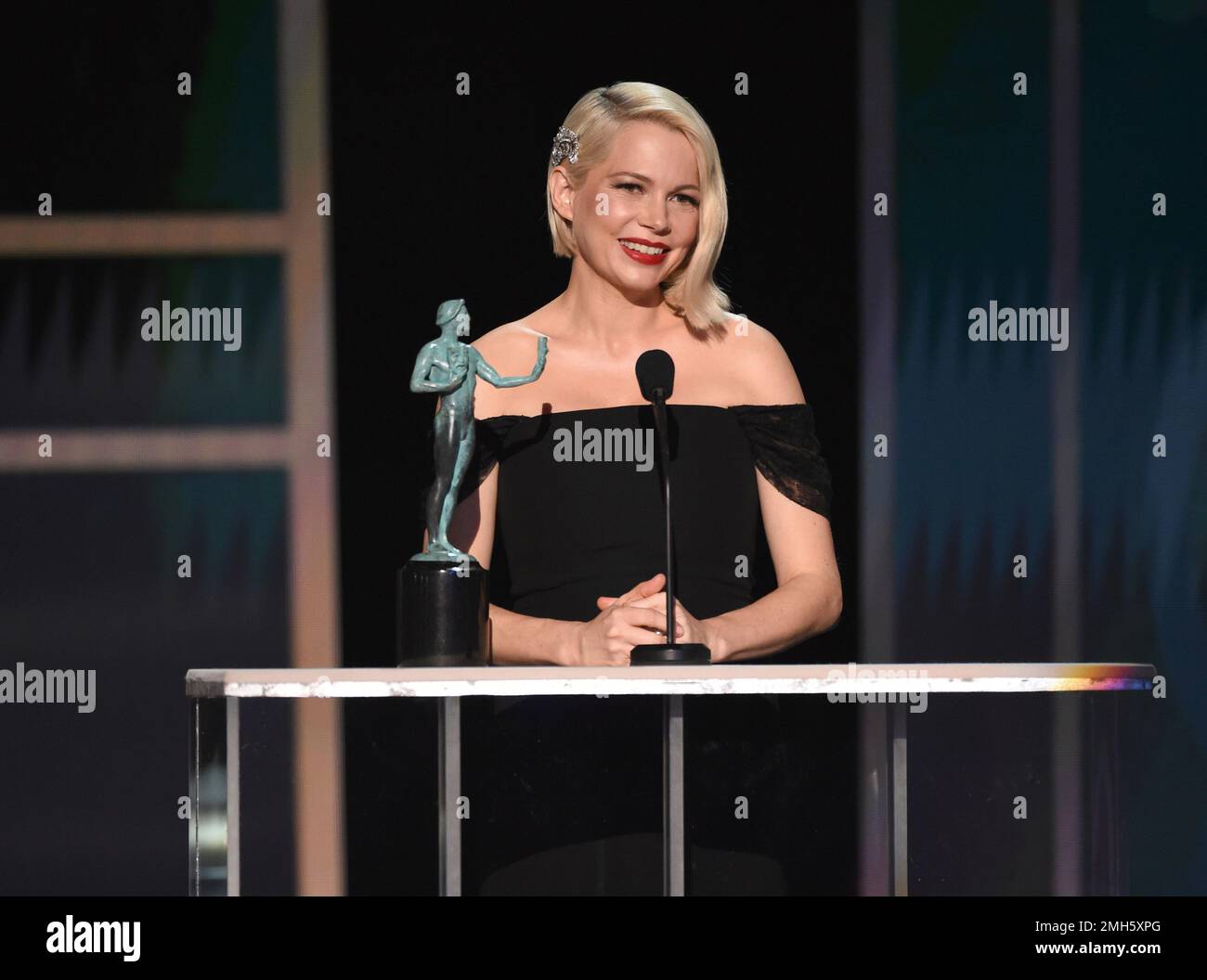 Michelle Williams accepts the award for outstanding performance by a ...