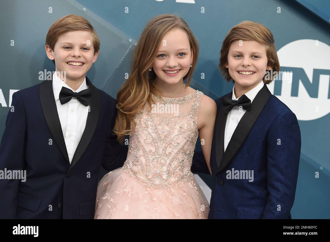 Cameron Crovetti, from left, Ivy George, and Nicholas Crovetti arrive ...