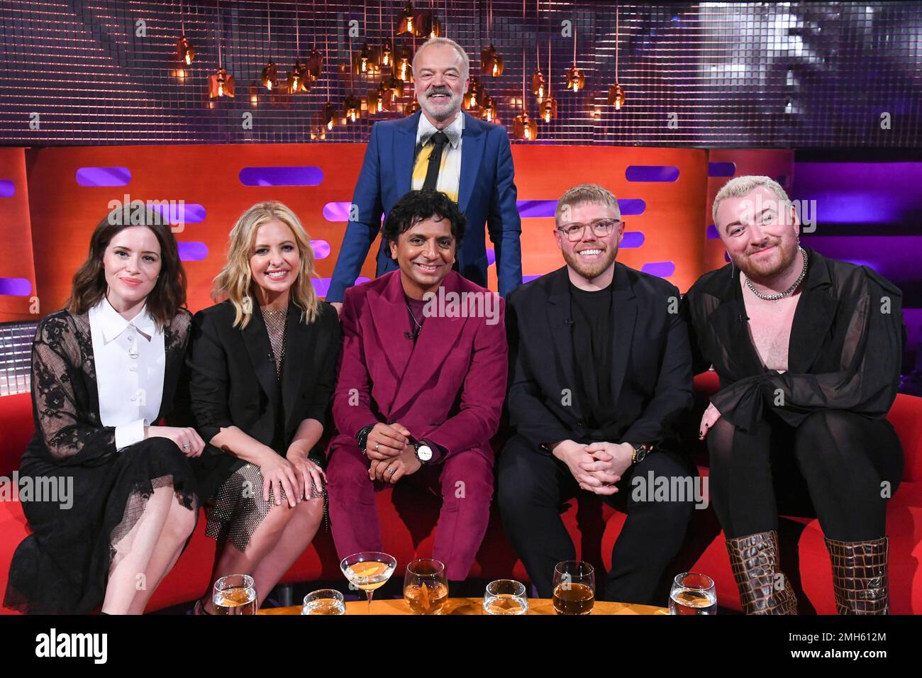 EDITORIAL USE ONLY Host Graham Norton (back row) with (left to right) Claire Foy, Sarah Michelle ...