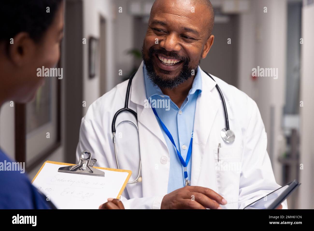 African male female uniform talking hi-res stock photography and images ...