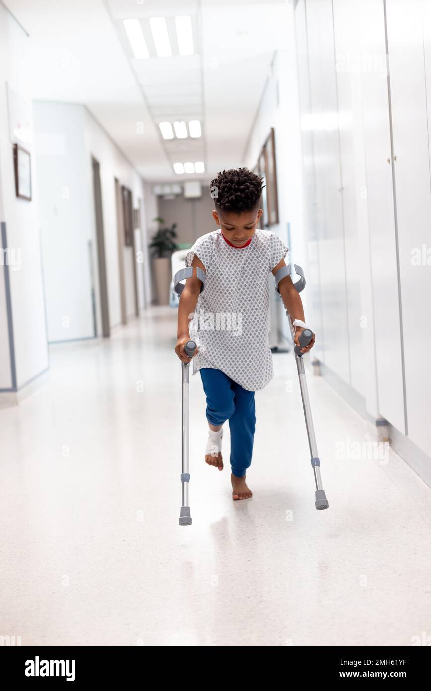 Boy crutches doctor hi-res stock photography and images - Alamy