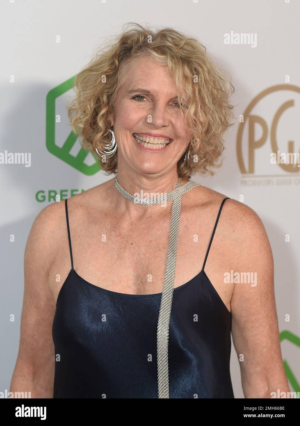 Suzanne Buirgy arrives at the 31st Annual Producers Guild Awards at the ...