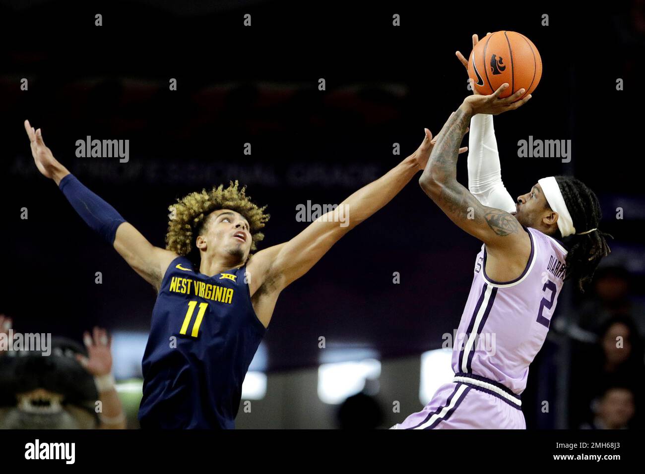 Kansas State's Cartier Diarra (2) shoots over West Virginia's Emmitt ...
