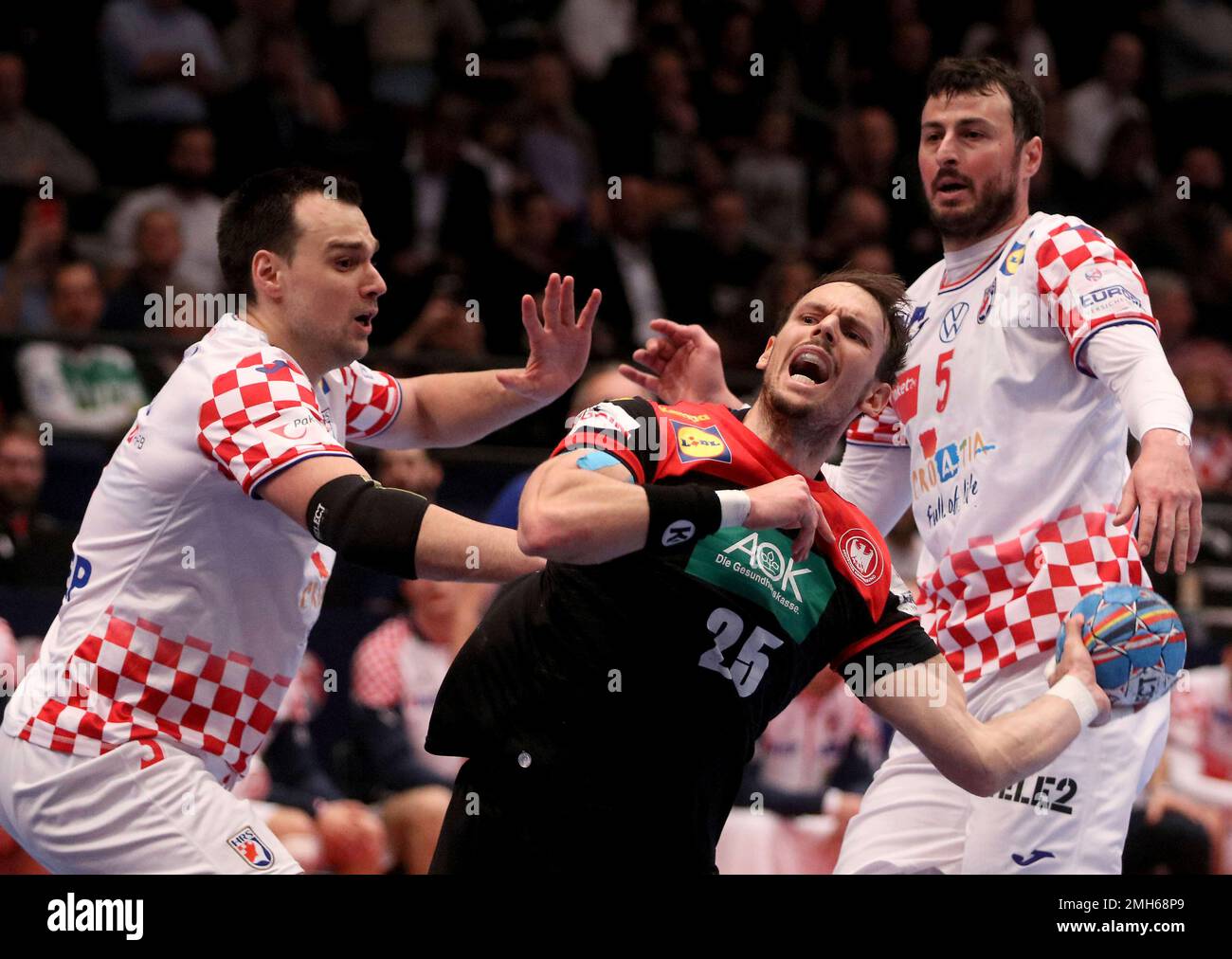 Croatia's Marino Maric, left, and Domagoj Duvnjak, right, block Germany ...