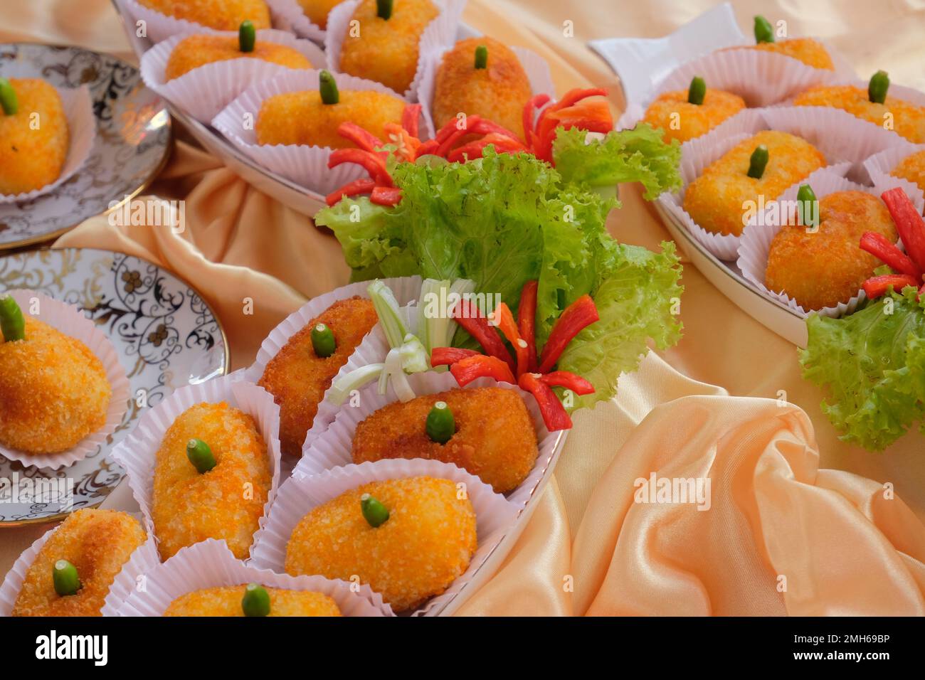 Kroket kentang is a traditional snack from Indonesia. served in wooden ...