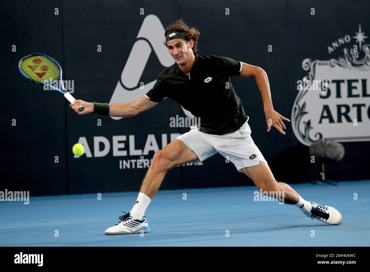 South Africa's Lloyd Harris plays a shot against Russia's Andrey Rubley ...