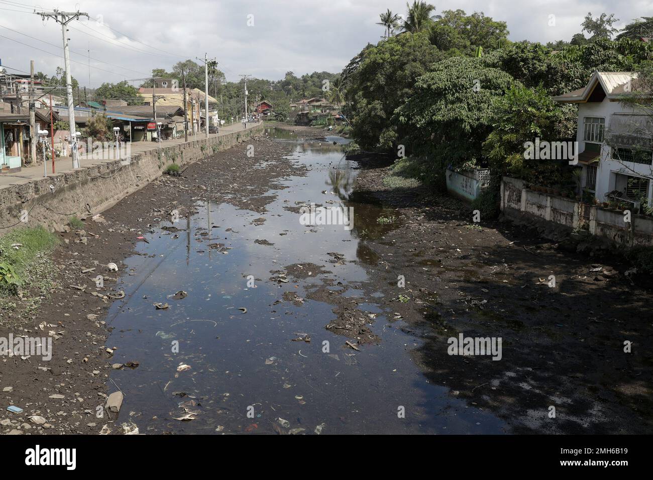 A portion of Pansipit river is shown without water after Taal volcano's ...