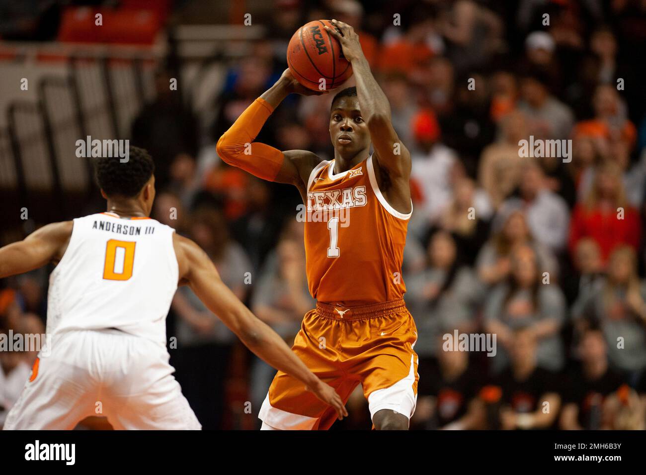 Texas guard Andrew Jones (1) throws a pass during an NCAA college ...