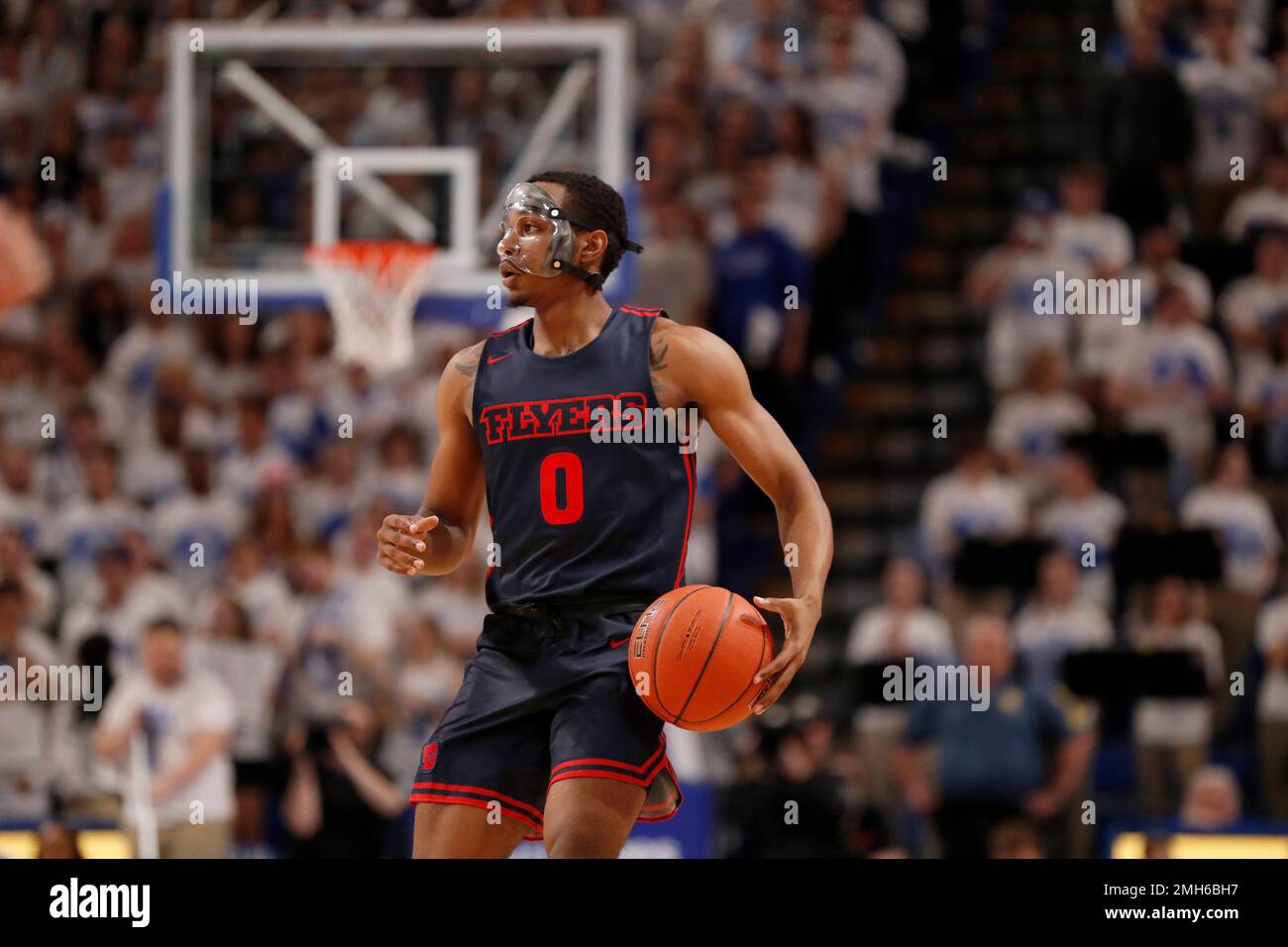 Dayton's Rodney Chatman brings the ball down the court during the first ...