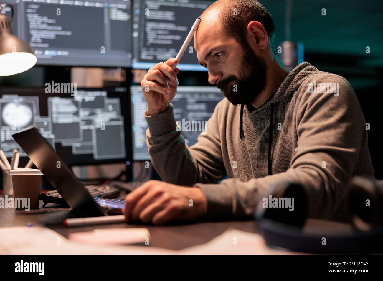 Pensive Coder Brainstorming Ideas To Find Source Code And Develop Html Script On Terminal Window