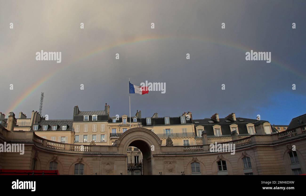 A rainbow fills the sky over the Elysee Palace in Paris, Friday, Jan ...