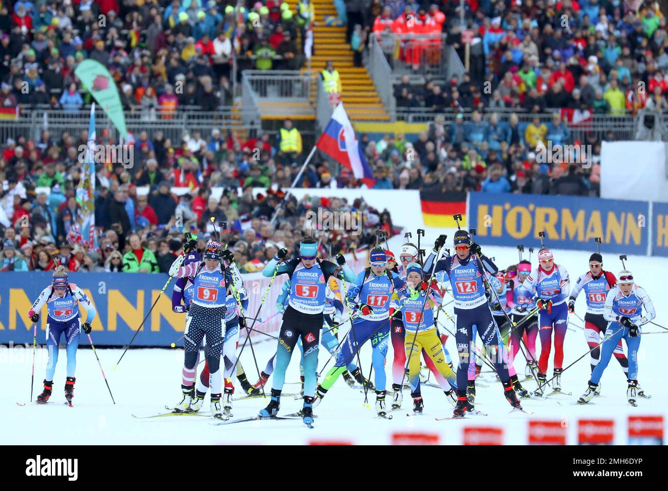 Athletes compete during the women's 4x6 km relay competition at the ...
