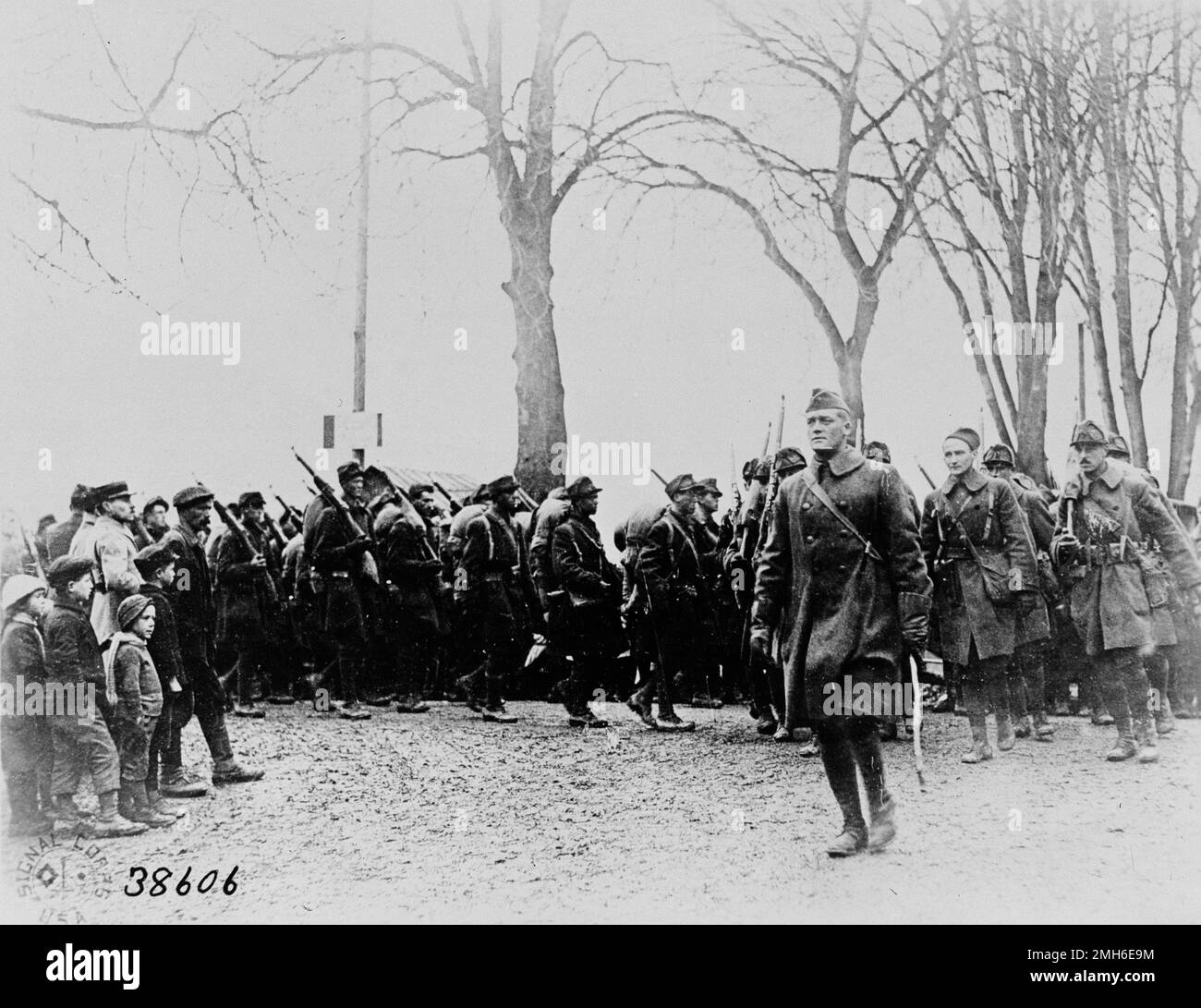 In this photo provided by the U.S. Army Signal Corps, infantrymen of ...
