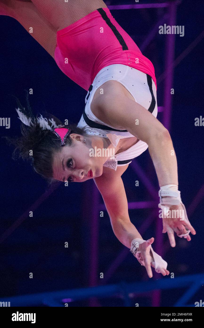 A performer from the Flying Tuniziani Trapeze group does a flip in the air during the 44th Monte ...
