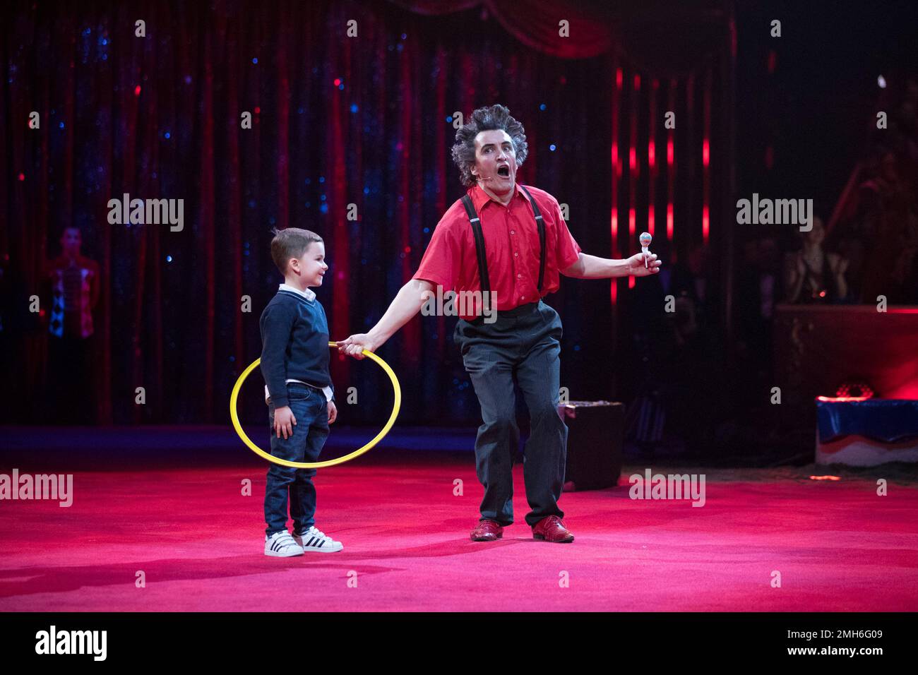 Elastic the Eccentric Comedian performs with a spectator during the ...