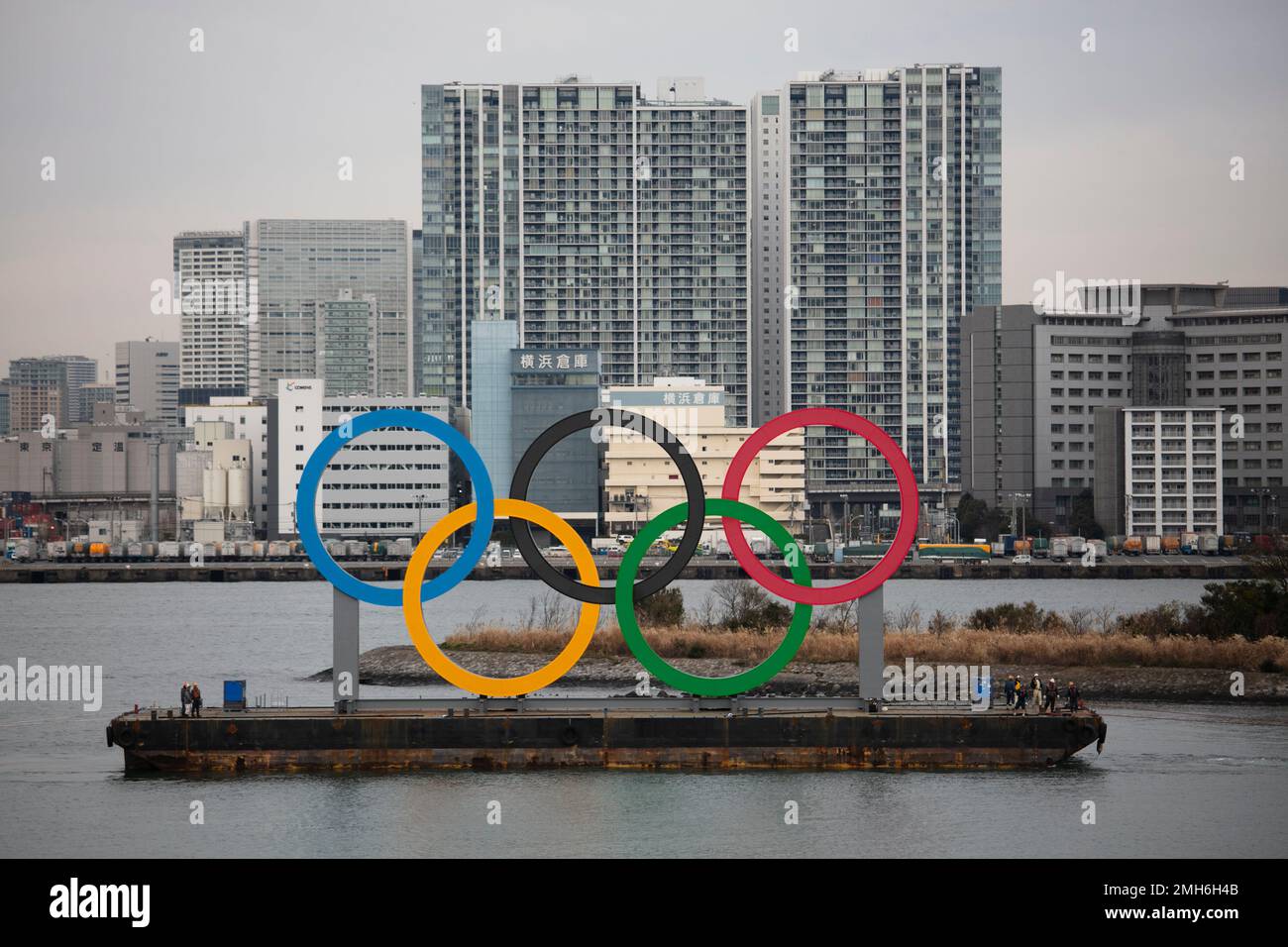 A barge carrying the Olympic Rings floats in the water Friday, Jan. 17 ...
