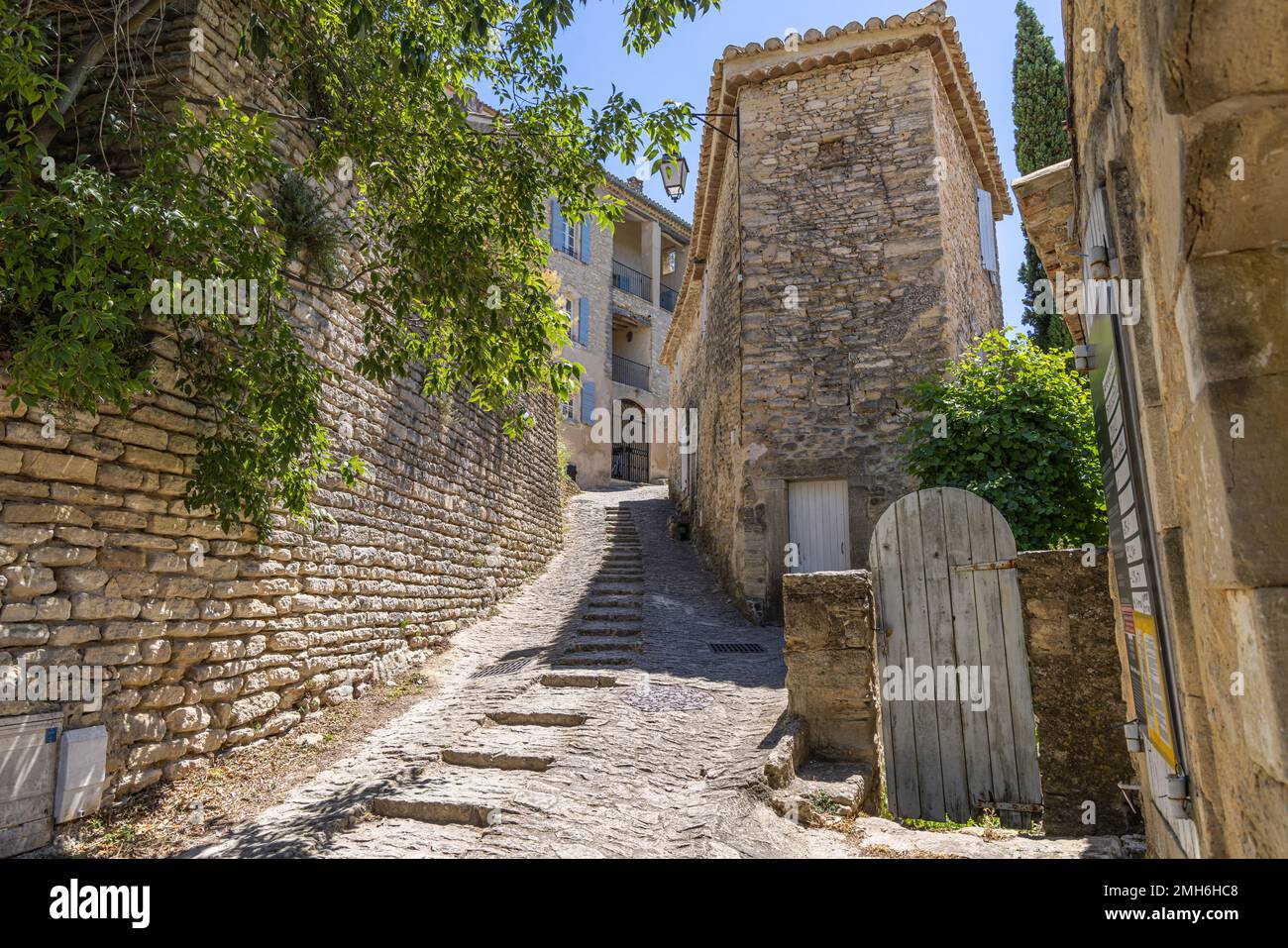Gordes, Vaucluse, Provence-Alpes-Cote d'Azur, France. A steep narrow ...