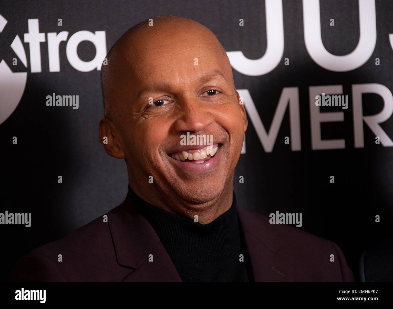 Bryan Stevenson poses for photographers upon arrival at the premiere ...