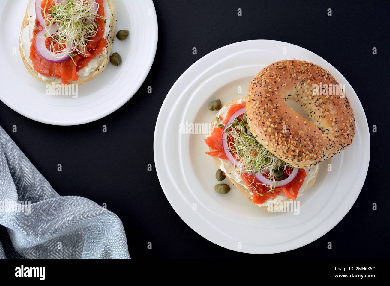 Fresh and healthy smoked salmon lox on sesame seed poppy seed bagel ...