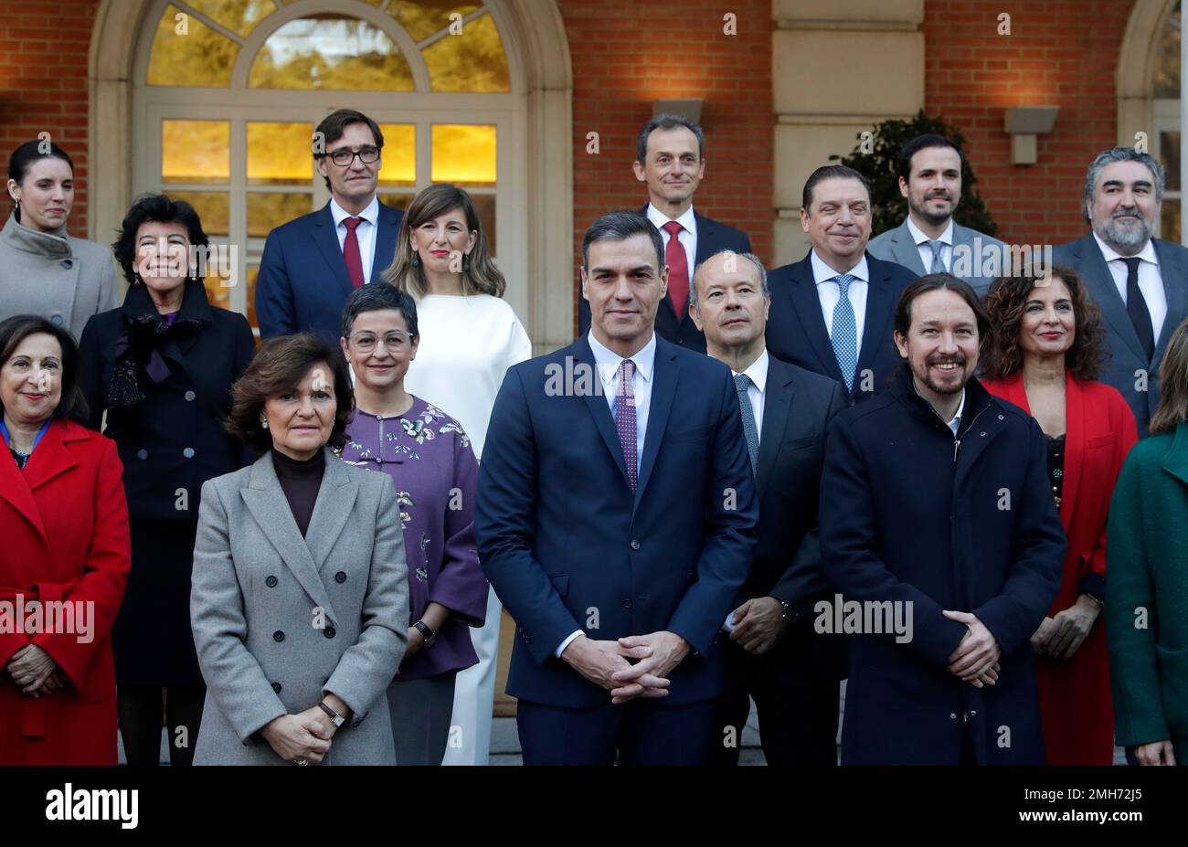 Spain's Prime Minister Pedro Sanchez, centre, poses for a photo with ...
