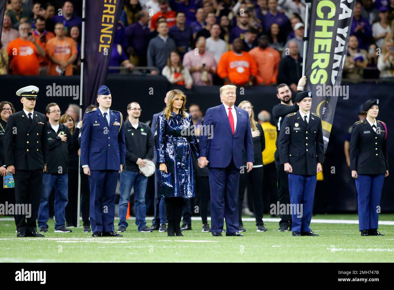 President Donald Trump, center right, and first lady Melania Trump ...