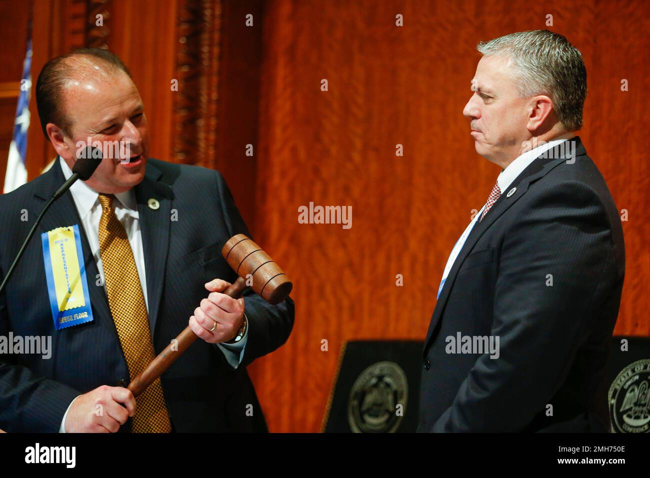 Exiting House Speaker Taylor Barras, R-New Iberia, left, prepares to ...