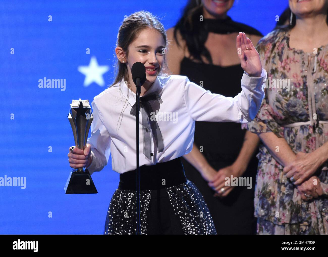 Julia Butters reacts onstage as the cast of "Once Upon a Time in ...