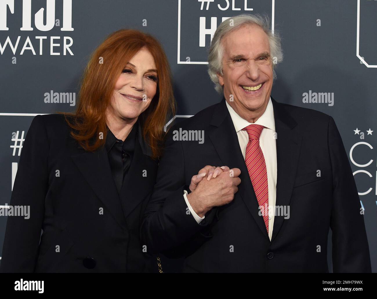 Stacey Weitzman, left, and Henry Winkler arrive at the 25th annual ...