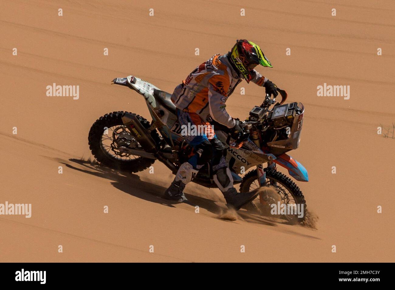 Kyle Mc Coy of United States pushes his KTM motorbike during stage ...