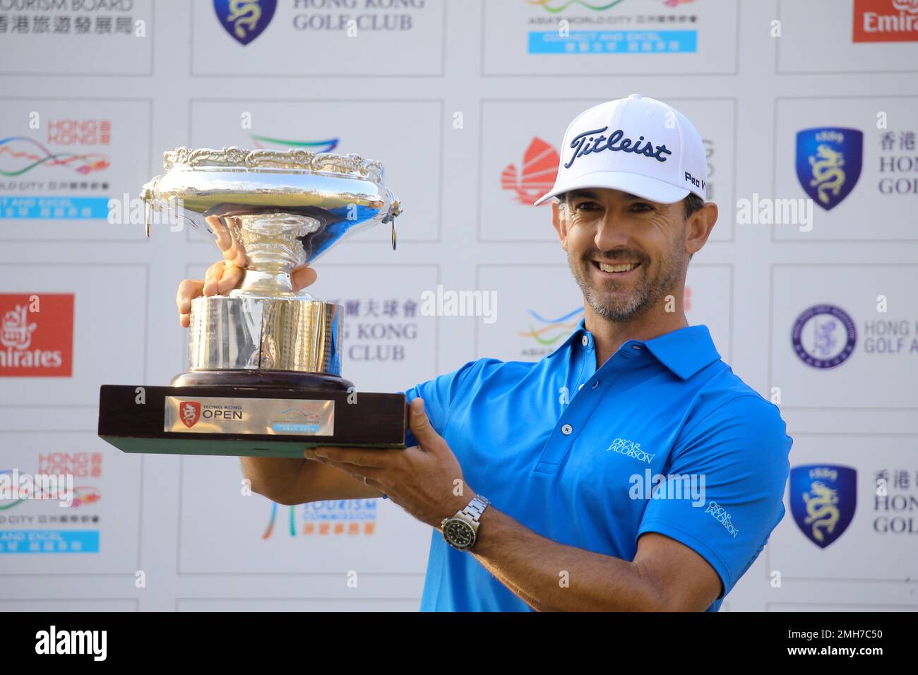 Wade Ormsby of Australia raises the trophy after winning the Hong Kong ...