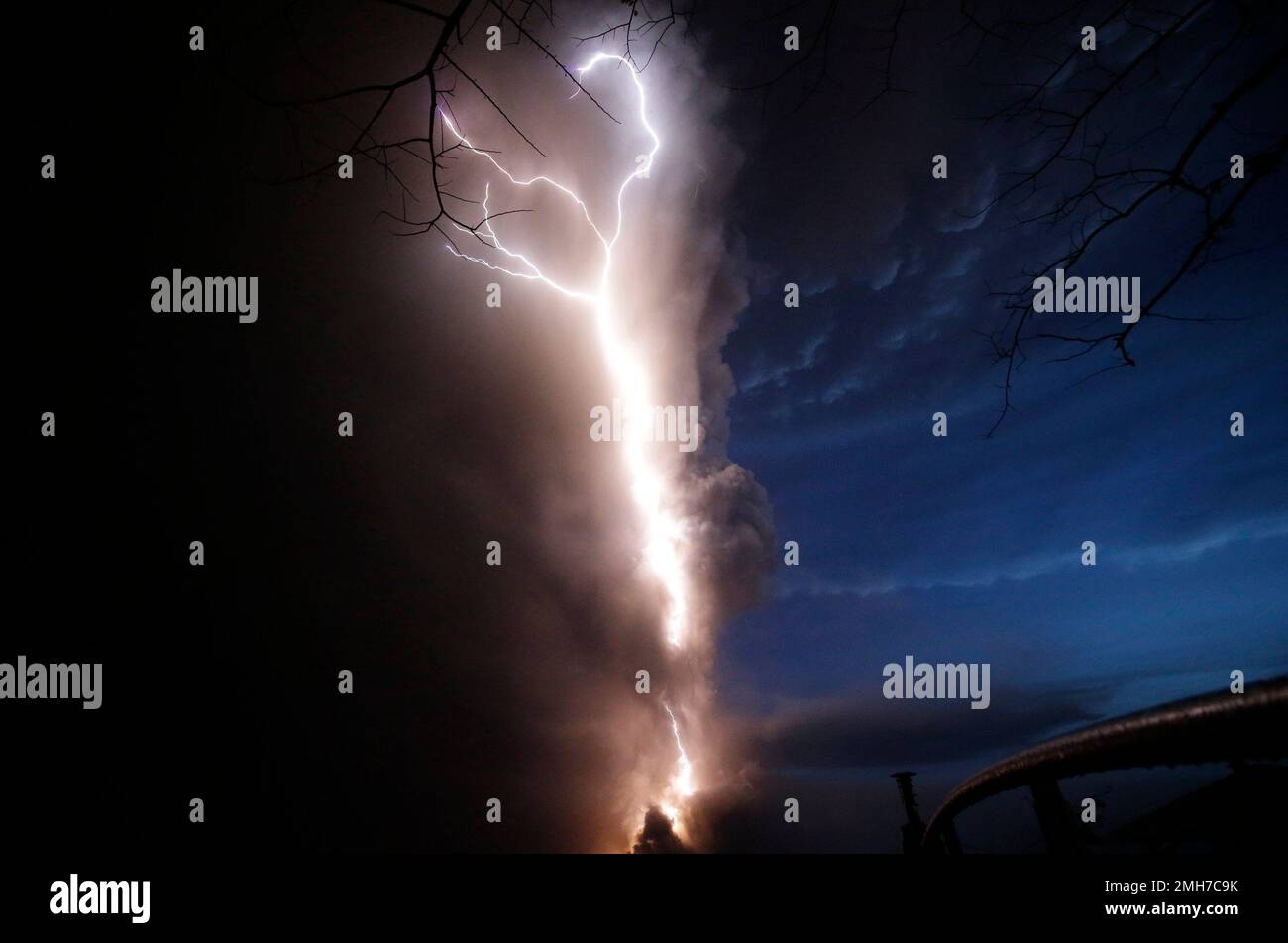 Lightning flashes as Taal Volcano erupts Sunday Jan. 12, 2020, in ...
