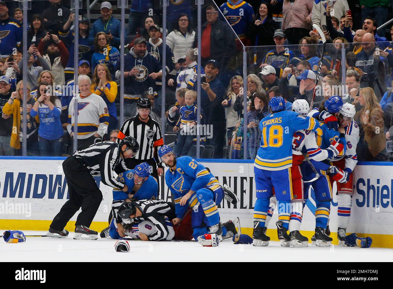 St. Louis Blues and New York Rangers players fight at the conclusion of ...