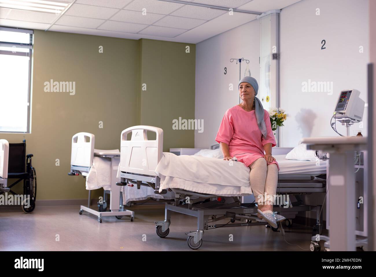 Cancer Patient In Hospital Bed