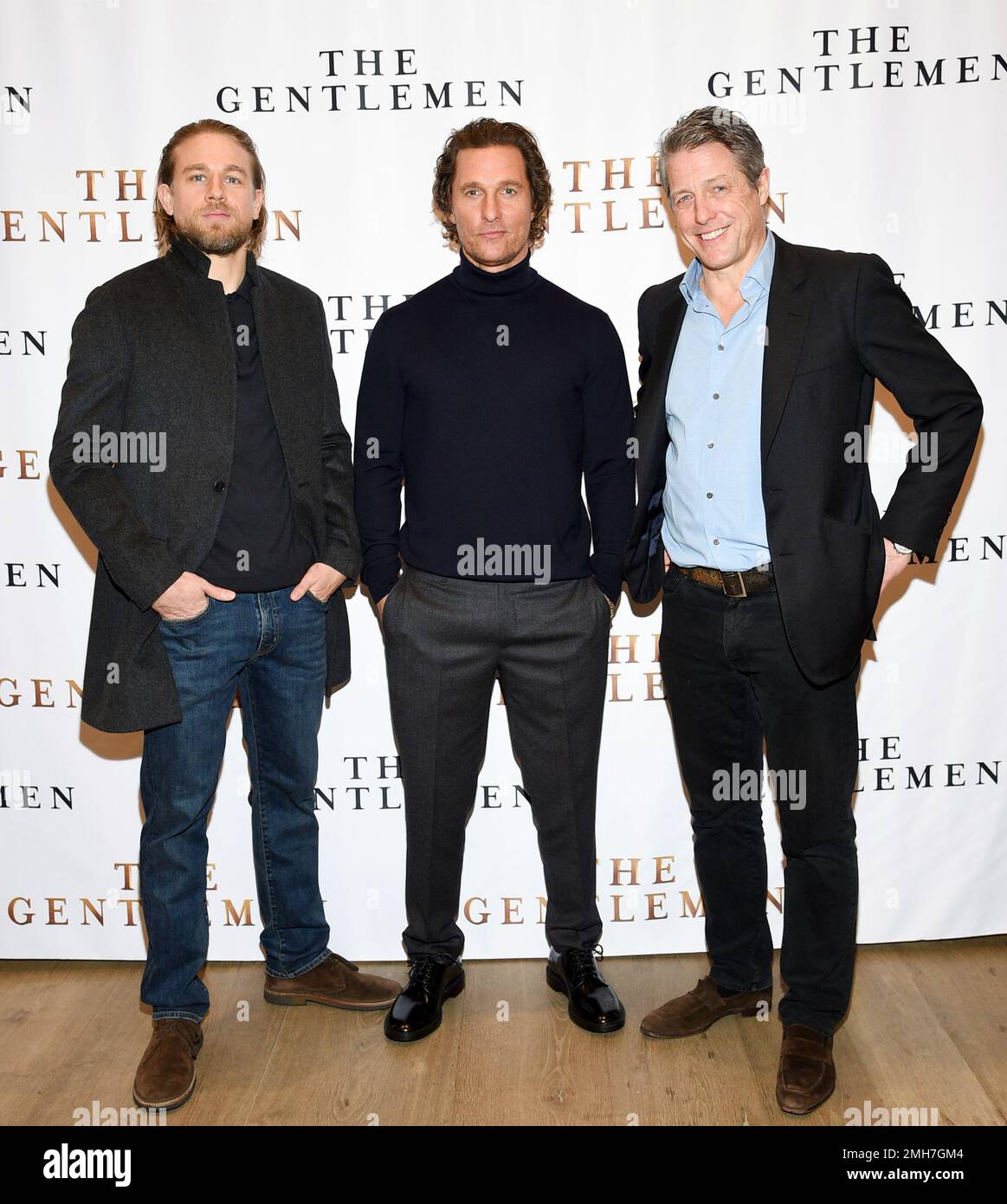 Actors Charlie Hunnam, left, Matthew McConaughey and Hugh Grant pose ...