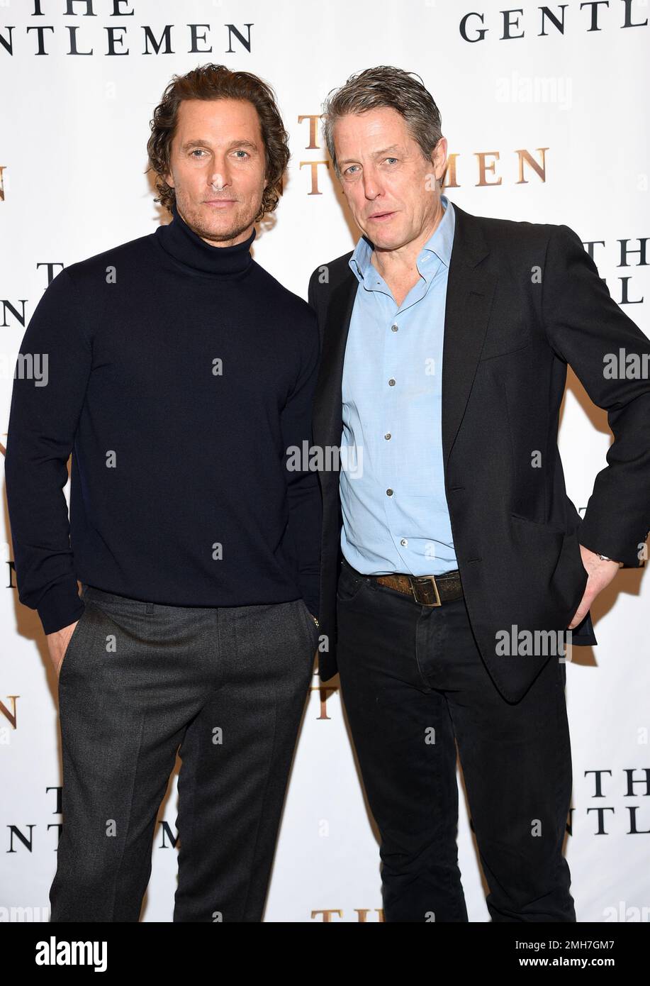 Actors Matthew McConaughey, left, and Hugh Grant pose together during ...