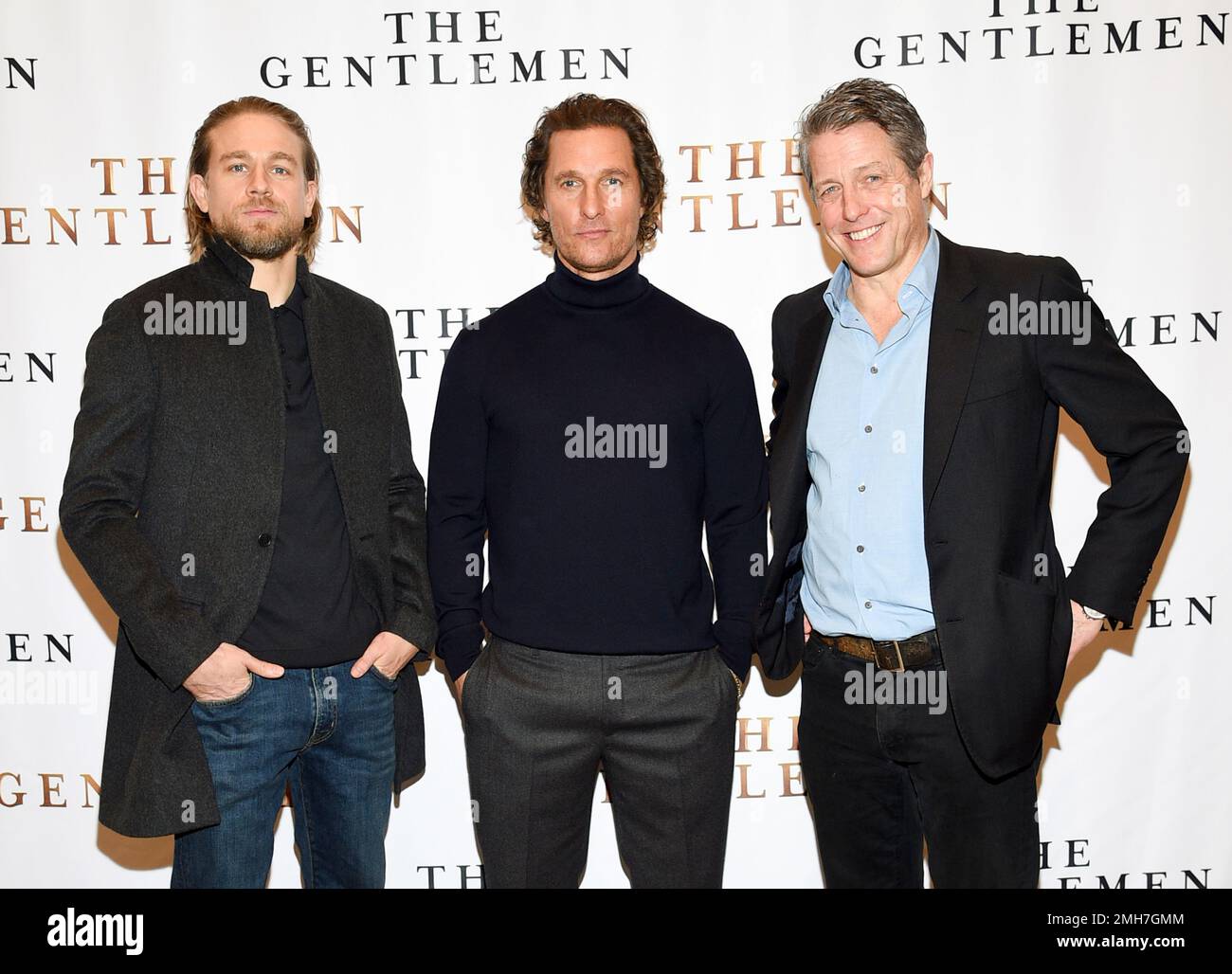 Actors Charlie Hunnam, left, Matthew McConaughey and Hugh Grant pose ...