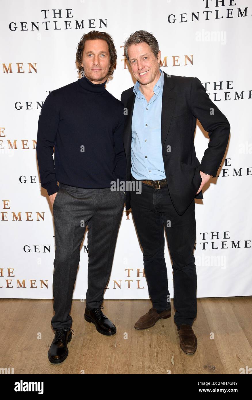 Actors Matthew McConaughey, left, and Hugh Grant pose together during ...