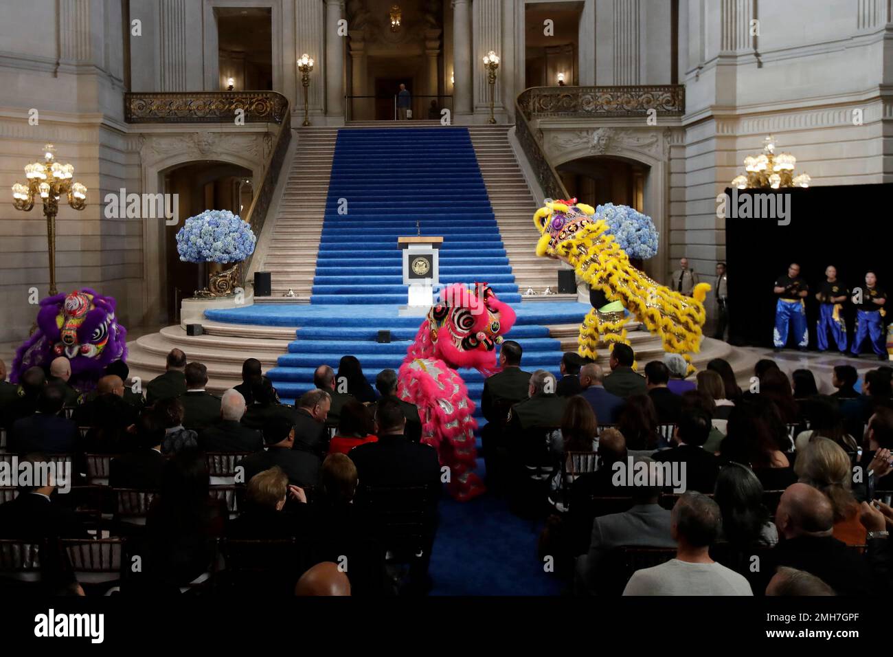 Lion dancers perform during the swearing in ceremony for San Francisco ...